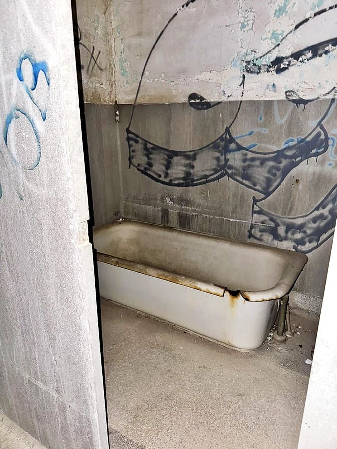 This bathtub has seen better days, much like the patients who once used it during their stays.