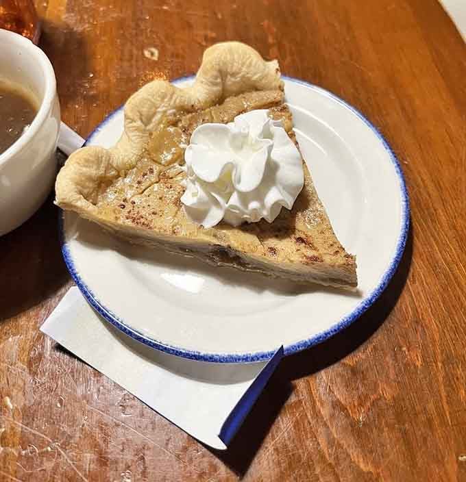 Cinnamon pie with a dollop of whipped cream, because sometimes simple pleasures are the most profound ones.