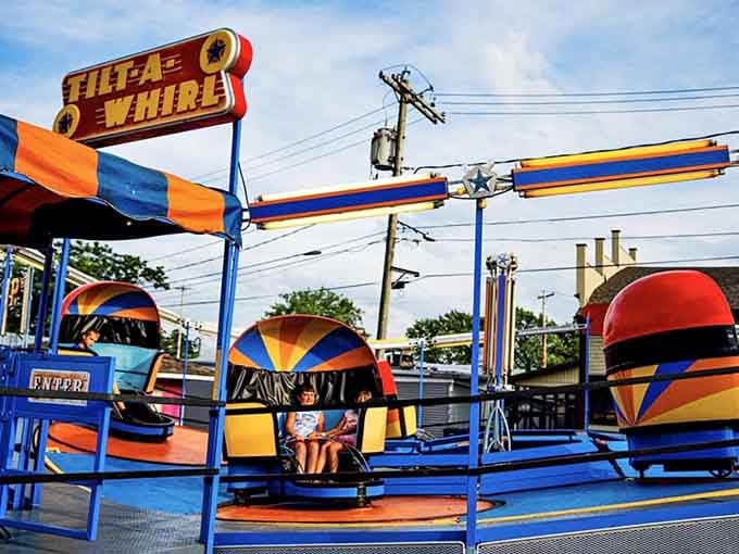 The Tilt-A-Whirl, nature's chiropractor, spins riders in those iconic colorful pods while testing the strength of everyone's breakfast decisions.