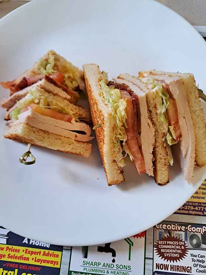 This club sandwich is stacked higher than your weekend plans and infinitely more satisfying than most of them.