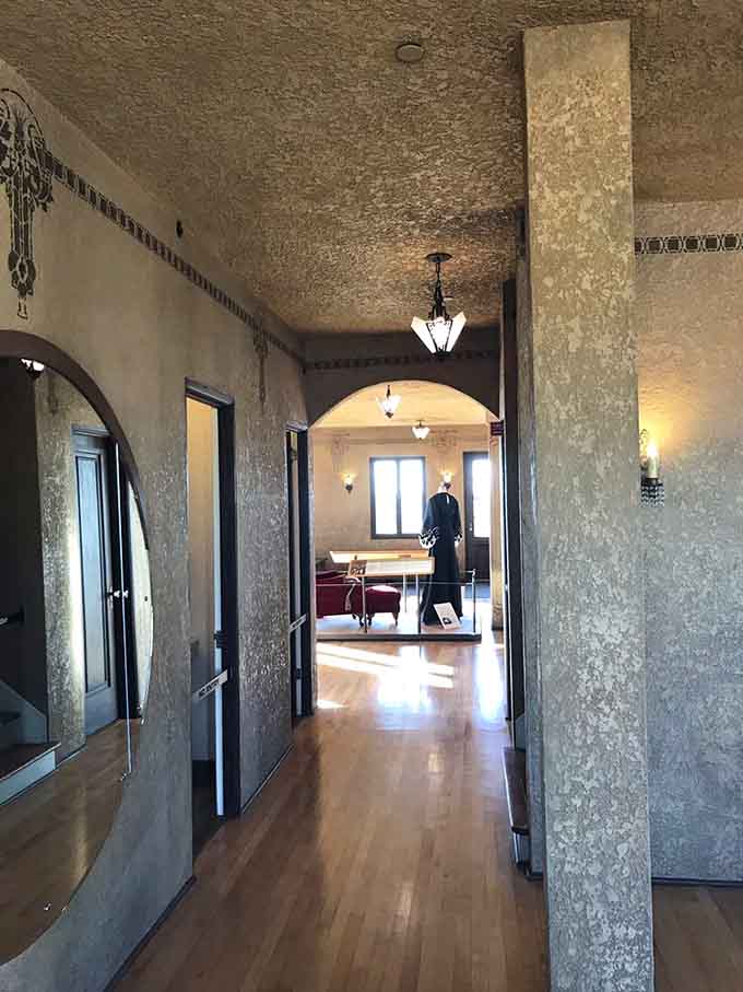 Hallways gleam with Art Deco elegance, leading you deeper into a world where every detail tells a story.