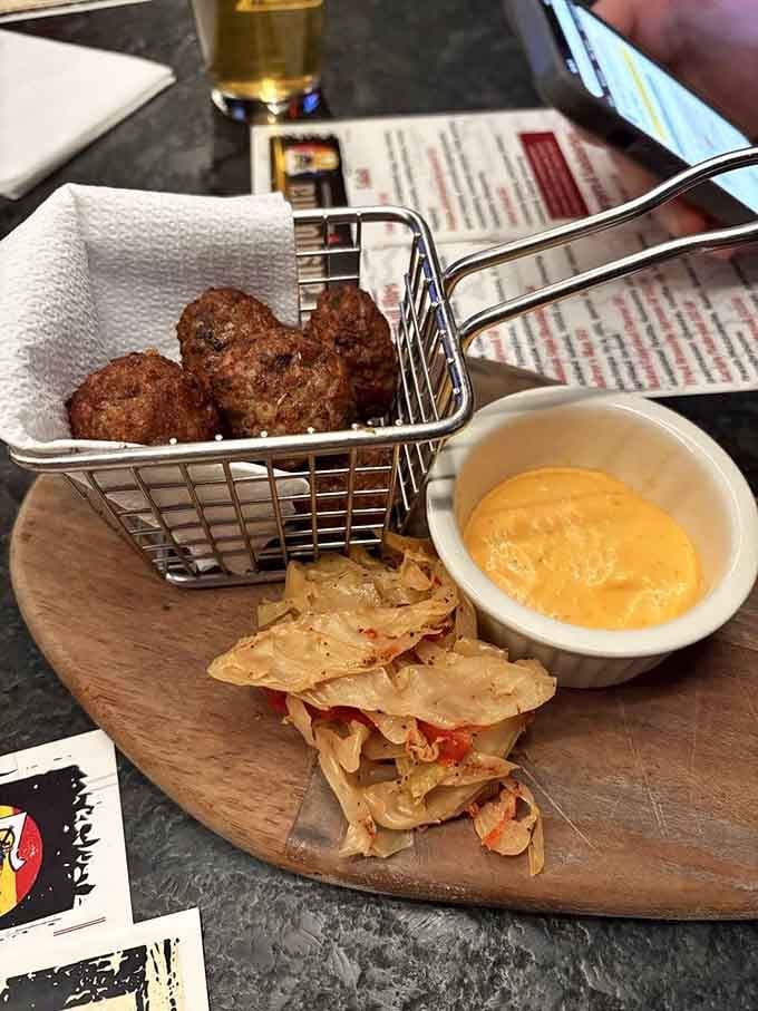 Romanian meatballs served in a tiny fry basket with dipping sauce turn appetizers into an event worth celebrating.