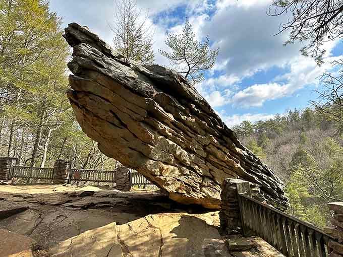 Balanced Rock defies physics and common sense, perched impossibly on its narrow base for thousands of years somehow.