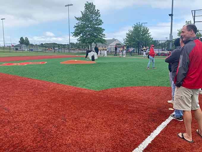 Baseball fields mean America's pastime lives on, complete with proud parents and enthusiastic cheering.