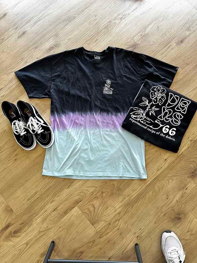 The holy trinity of skater style: graphic tee, classic Vans, and the confidence that comes from saving enough for lunch afterward.