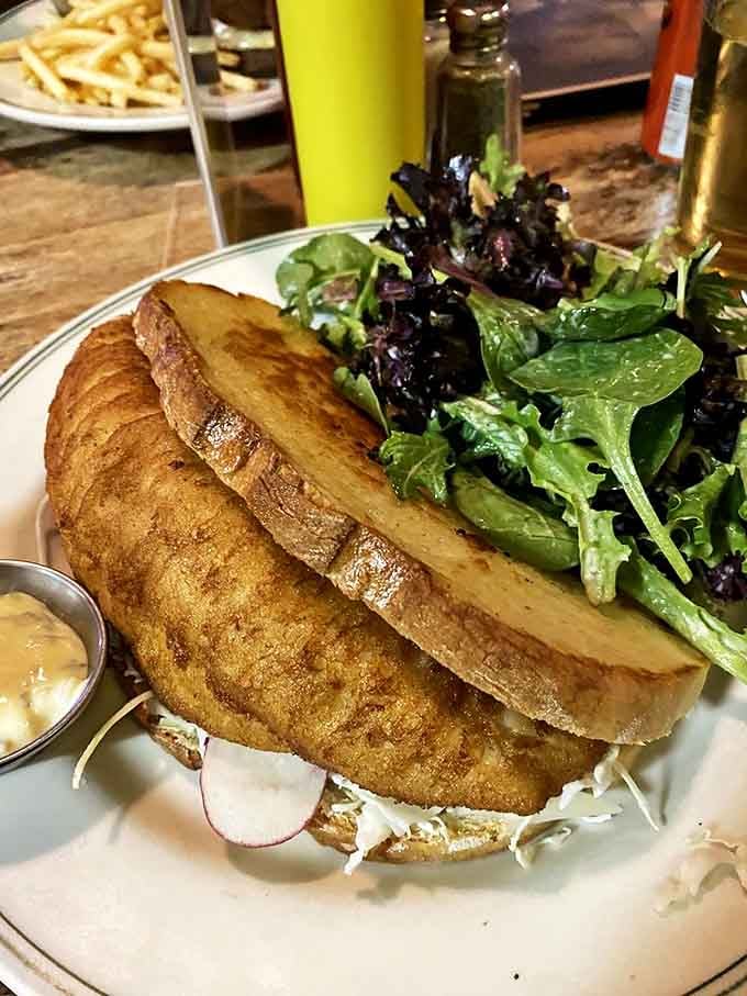 This sandwich isn't just lunch&mdash;it's an edible postcard from Wisconsin's lakes, with golden-fried walleye stealing the show.