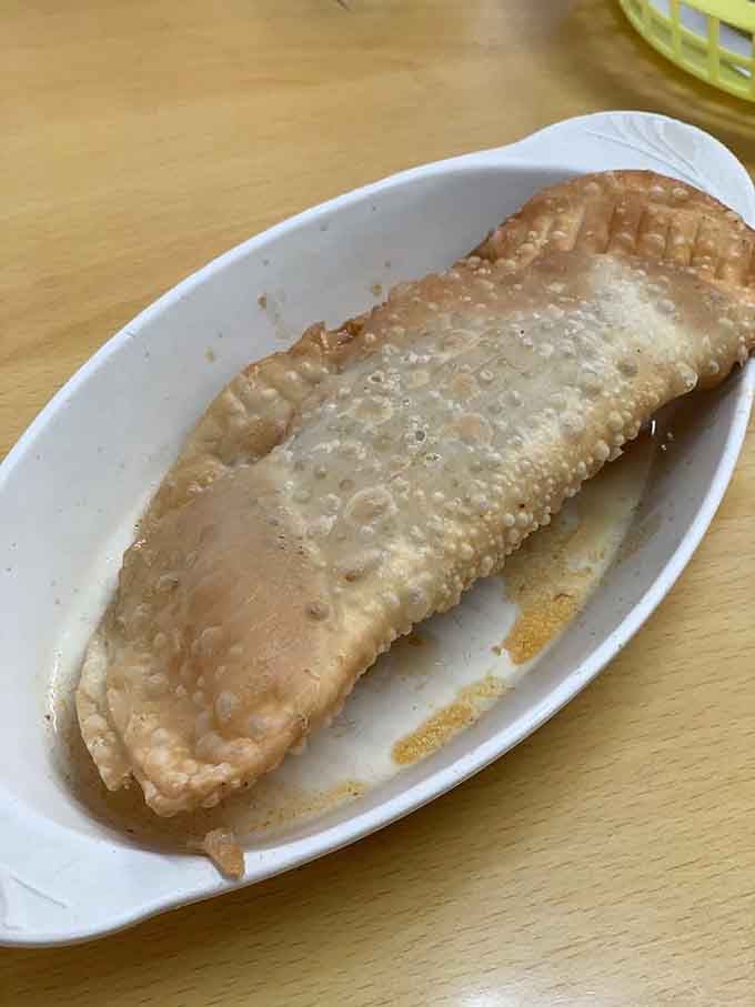 That empanada de ropa vieja is stuffed with shredded beef goodness that'll make you weep with joy.