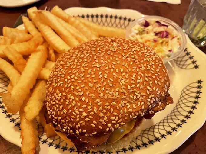 A sesame-studded burger that's thick, juicy, and completely unapologetic about its size, just like burgers should be.