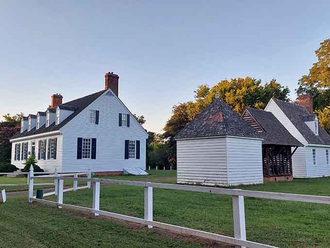 The Dudley Digges House showcases elegant colonial architecture, its white fence framing centuries of American history perfectly.