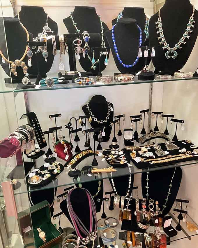 Vintage jewelry sparkling under the lights, each piece once adorned someone's special occasion or everyday elegance.