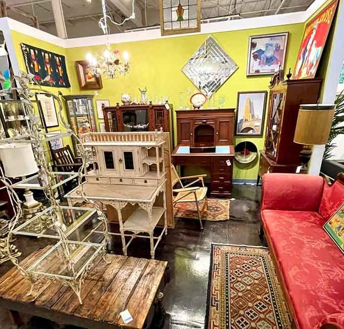 A color-drenched corner that proves eclectic doesn't mean chaotic. That vibrant red sofa is practically begging for someone interesting to sit on it.
