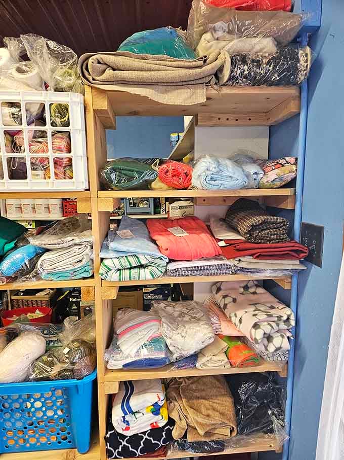 Bedding bonanza! These neatly folded linens and blankets promise cozy nights without the department store price tag.