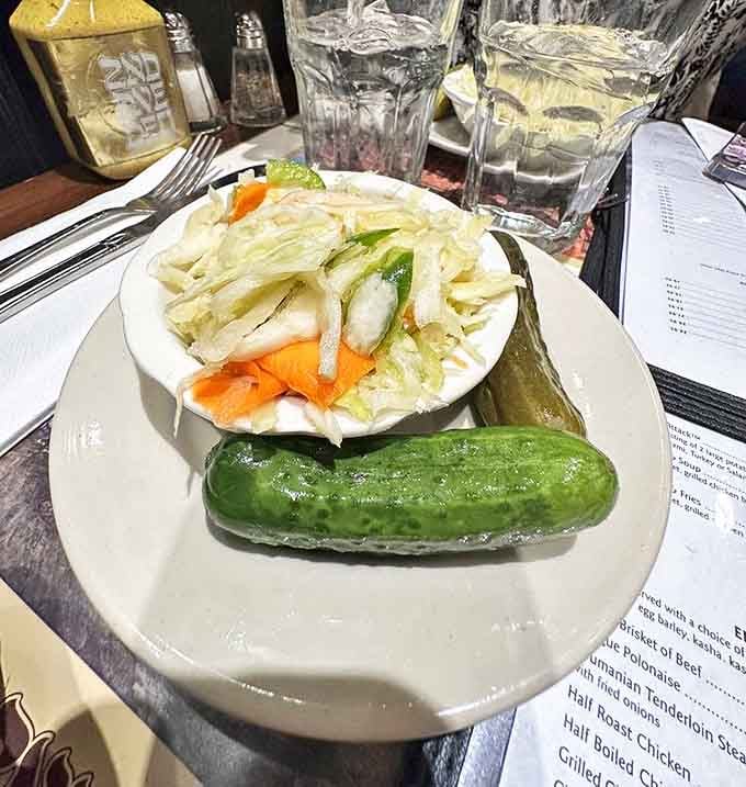 The complimentary pickle plate&mdash;where half-sours and full-sours peacefully coexist in a vinegary United Nations of palate cleansers.