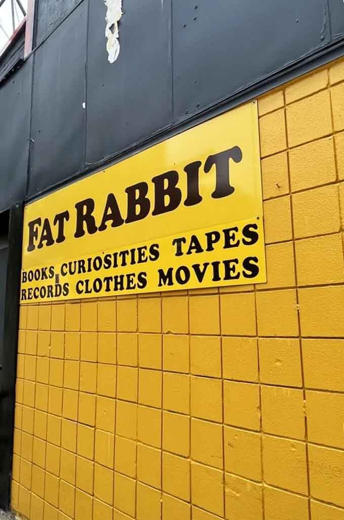 The store's signature yellow wall proudly announces its treasures: books, curiosities, tapes, records, clothes, and movies—a six-course meal for vintage lovers.