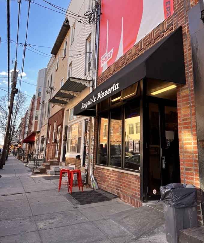 No fancy frills, just pizza thrills! This unassuming brick storefront hides Philadelphia's worst-kept secret for dough devotees.