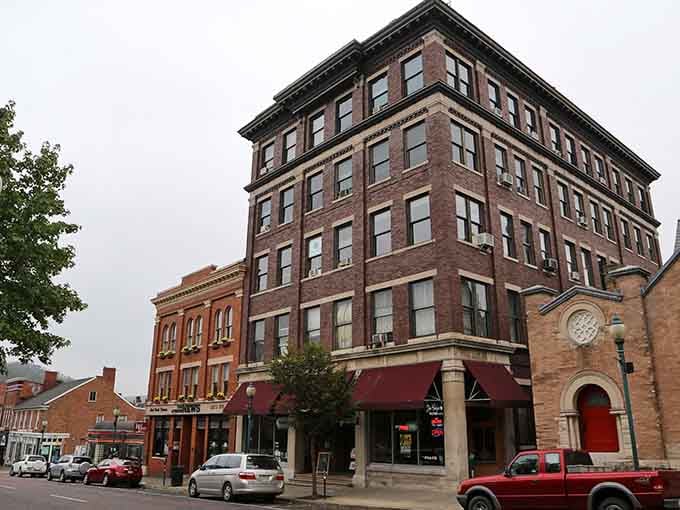 This imposing brick building commands respect, its multiple stories housing decades of stories within those solid walls.