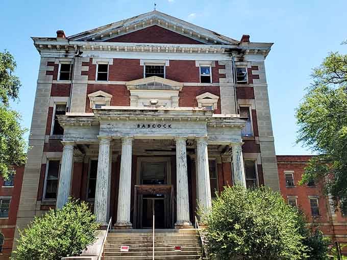 Grand columns and classical architecture can't hide the building's haunting past—beauty masking decades of difficult American history.