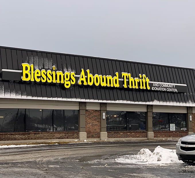 Blessings Abound's cheerful yellow sign brightens even the grayest Kansas day. Bargains with a purpose!