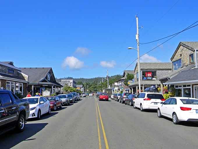 Parked cars fill both sides because locals know the good stuff is worth slowing down to discover.