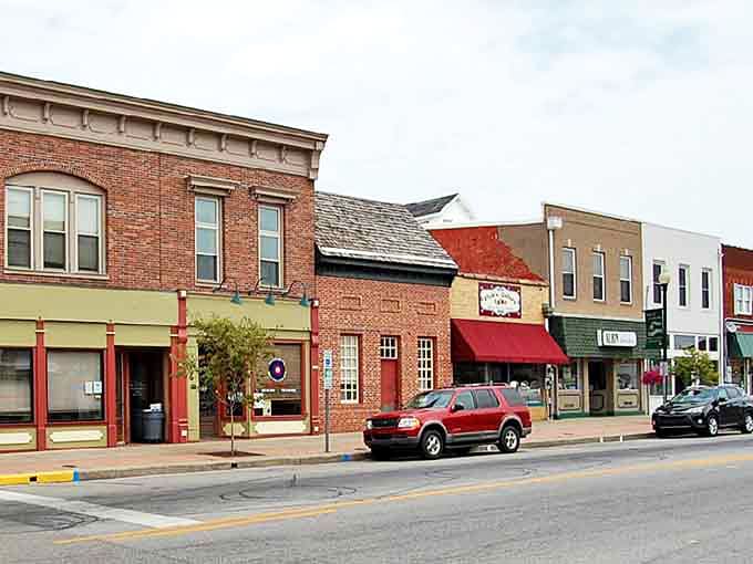 Corydon's charming main street showcases colorful historic buildings that house local shops and create a welcoming small-town atmosphere.