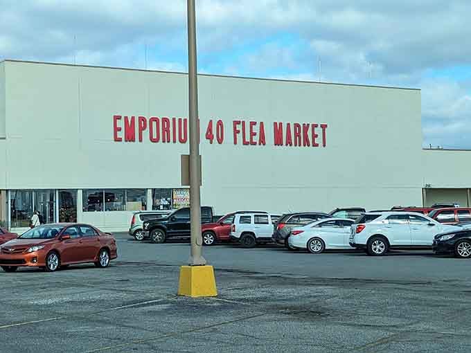 The massive parking lot hints at the sprawling indoor space where countless vendors await your curious exploration inside.