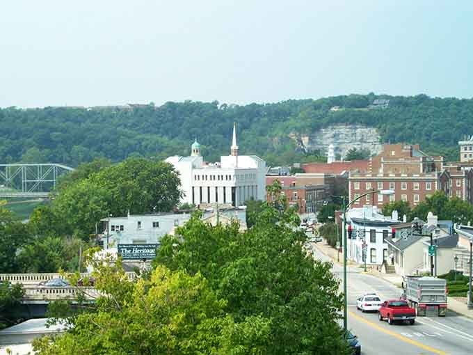 Tree-lined streets lead toward limestone cliffs, framing a capital city that remembers its small-town roots and reasonable prices.