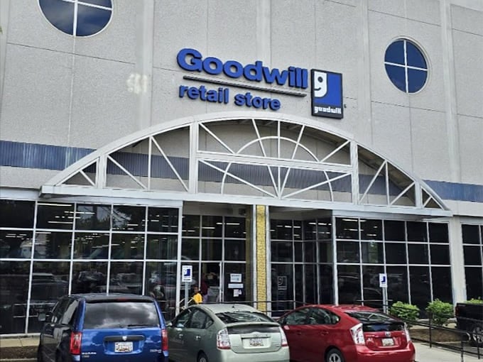 That distinctive arched entrance and blue signage welcome shoppers like old friends returning to their favorite haunt.