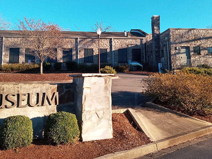 This stone museum building in Guntersville houses the area's rich history, its solid construction echoing the enduring spirit of the community.