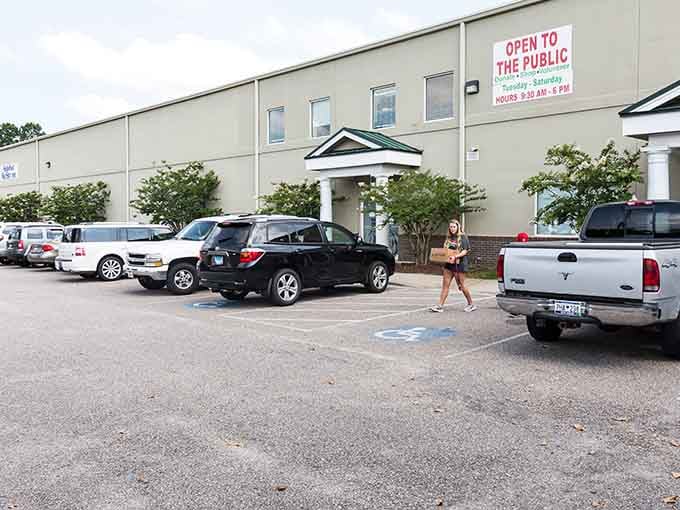 The busy parking lot and classical columns suggest this isn't your average thrift store experience at all.