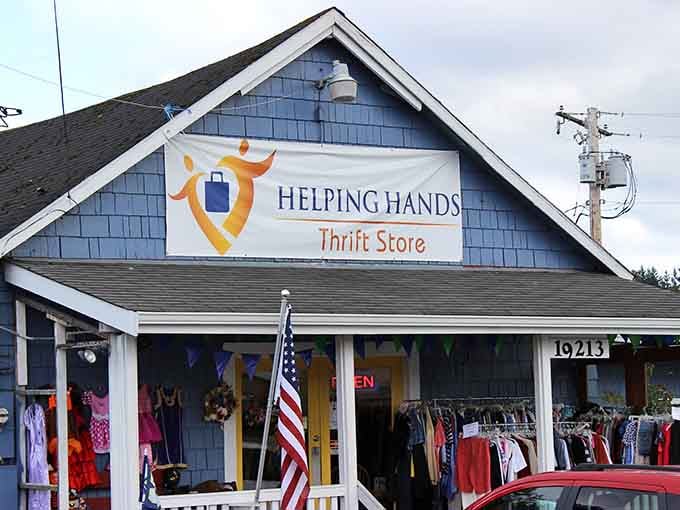 The charming cottage-style exterior with its cheerful blue siding and American flag feels like visiting your favorite aunt's house.