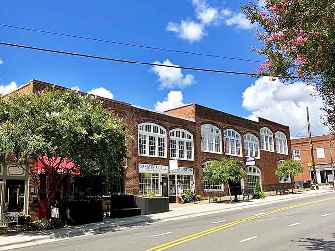 Arched windows and brick details showcase craftsmanship from an era when buildings were built to last generations.
