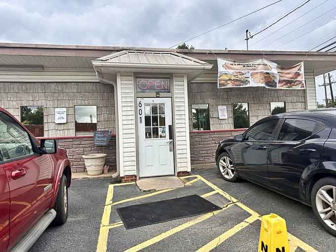 The modest entrance hides soul food magic that'll transport you straight back to Sunday dinners at grandma's house.