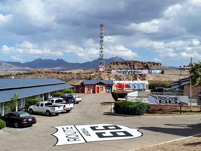 Route 66 painted bold on pavement, reminding everyone this legendary highway still runs through America's heartland proudly.