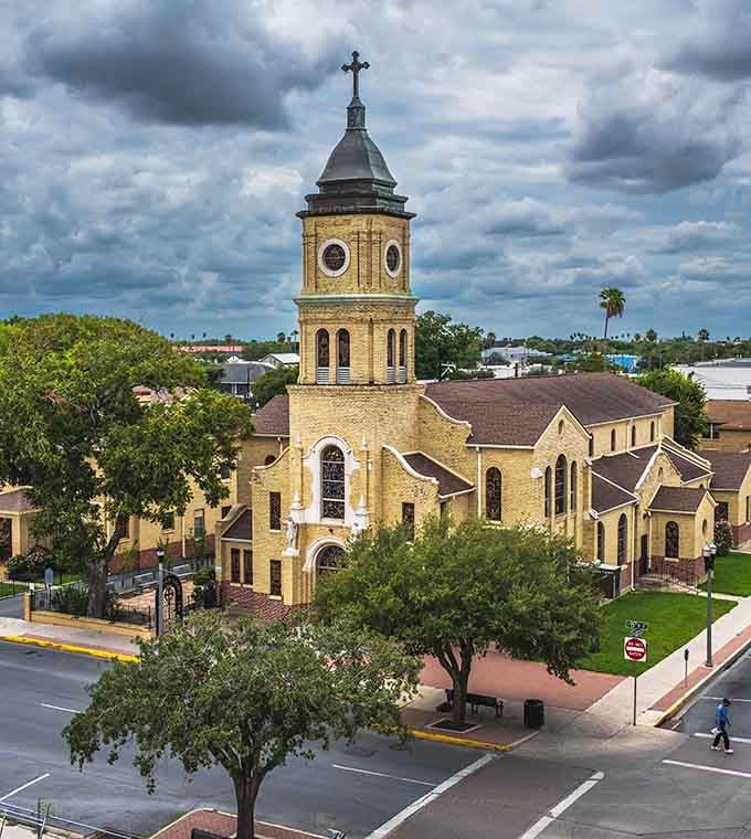 Historic limestone architecture reaches skyward, proving beauty and craftsmanship never go out of style, unlike bell-bottoms.