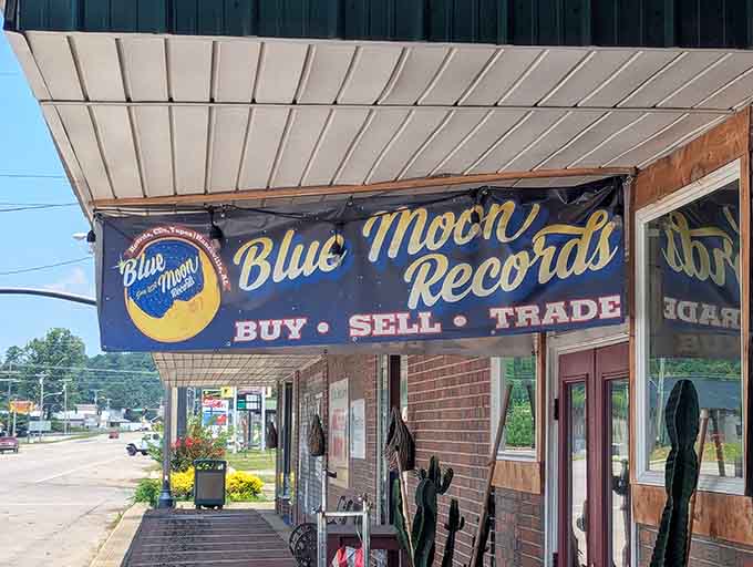 The cheerful moon logo promises musical dreams inside, where buying, selling, and trading keeps the vinyl circle of life spinning.