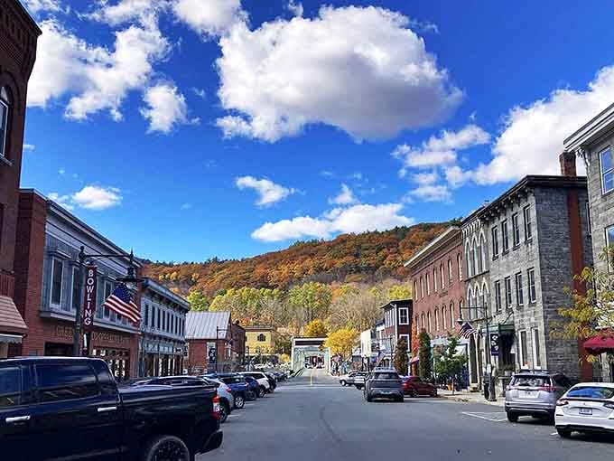 Mountains ablaze with fall colors frame this downtown where historic buildings nestle into the hillside like old friends.