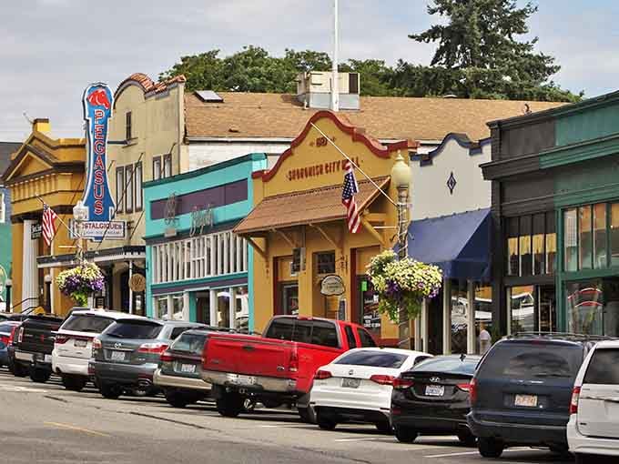 Colorful storefronts and hanging flower baskets create Main Street charm that makes you want to park and explore every shop.