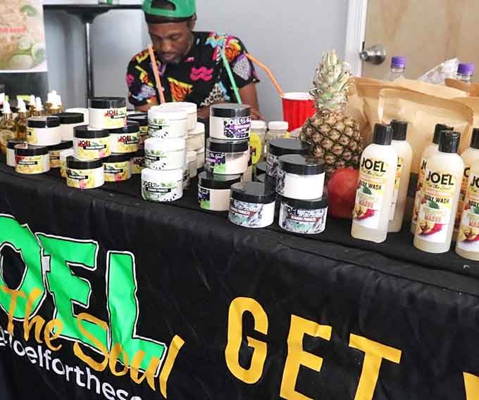 Natural hair care products and body butters line up like soldiers of self-care, celebrating community entrepreneurship beautifully.