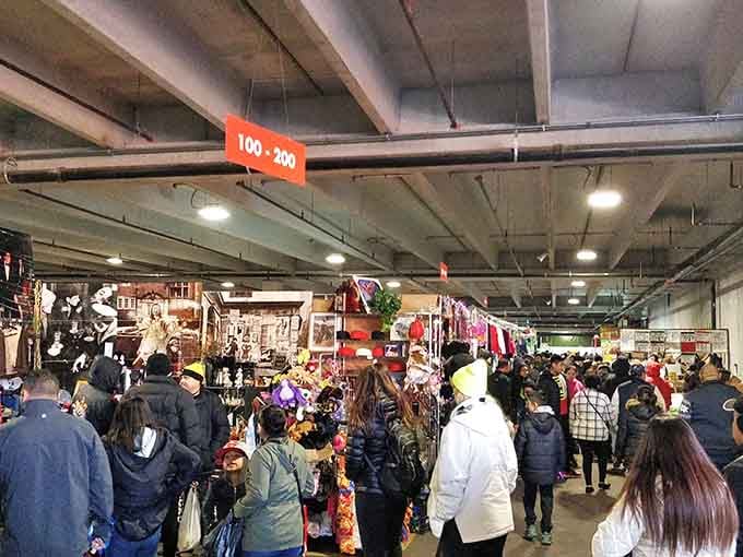 Inside, the organized chaos of vendor booths creates a maze where getting lost is half the fun and finding treasures is guaranteed.
