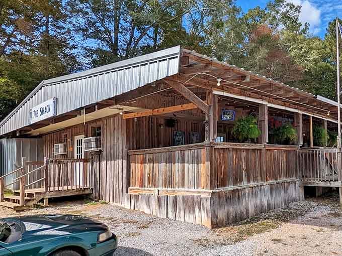 Weathered wood and rustic charm make this roadside spot look exactly like what great barbecue joints should be.