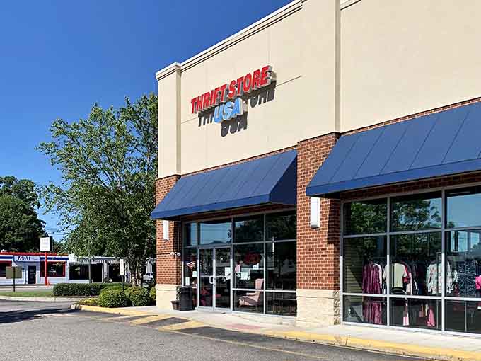 That blue awning and brick facade welcome bargain hunters like a friendly neighbor waving from the porch.