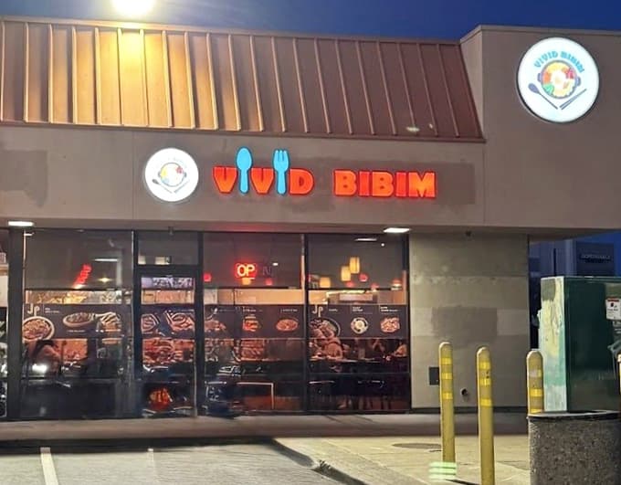 Colorful signage brightens this strip mall gem where Korean bibimbap bowls arrive fresh, healthy, and absolutely satisfying.