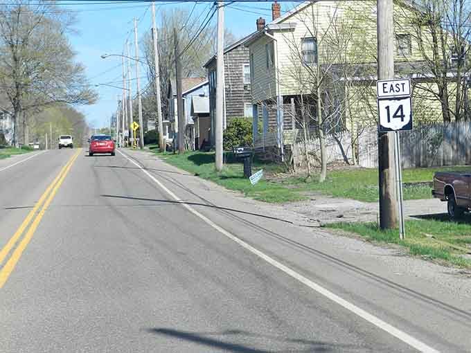 East Route 14 stretches past Washingtonville's historic homes, where neighbors wave and mortgage payments don't require a second job.