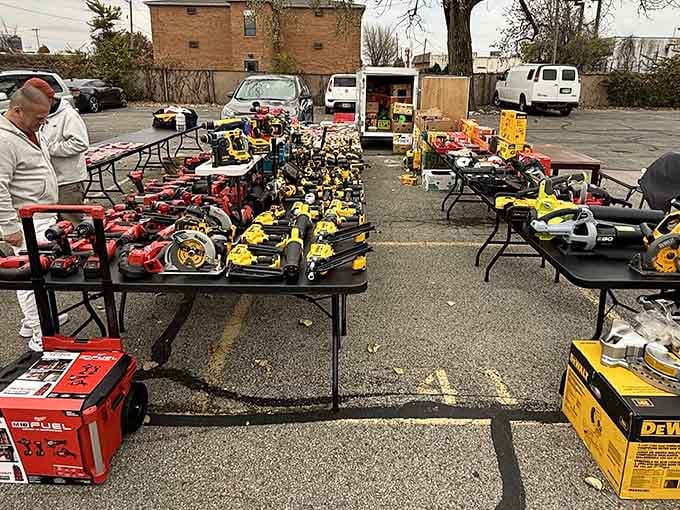 Power tools line the tables like a hardware store met a yard sale in perfect harmony.