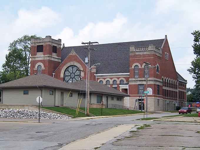Historic brick architecture meets practical small-town living where your neighbors still wave and bills stay manageable.
