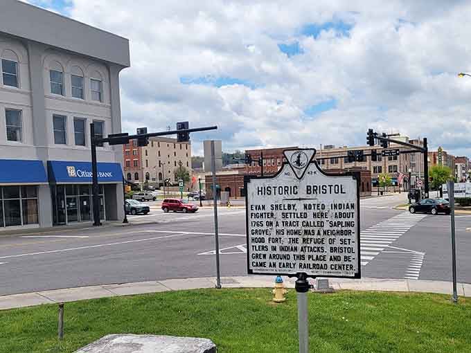Historic markers tell stories of the past while modern storefronts promise a future that honors both tradition and progress.
