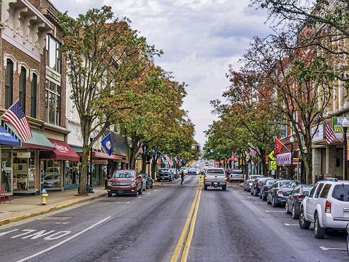 Mature trees shade sidewalks where historic architecture and small-town charm make every stroll feel like coming home again.