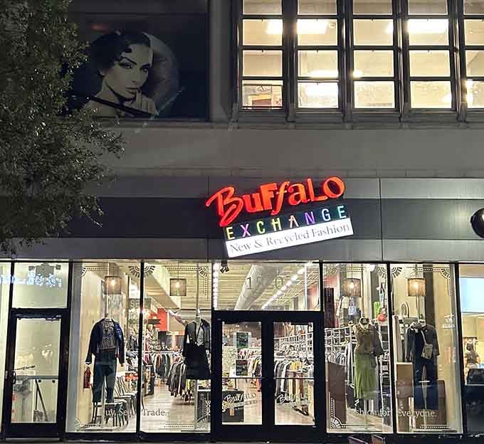 The evening glow and that neon sign create an almost theatrical atmosphere for the fashion-forward treasure hunter.