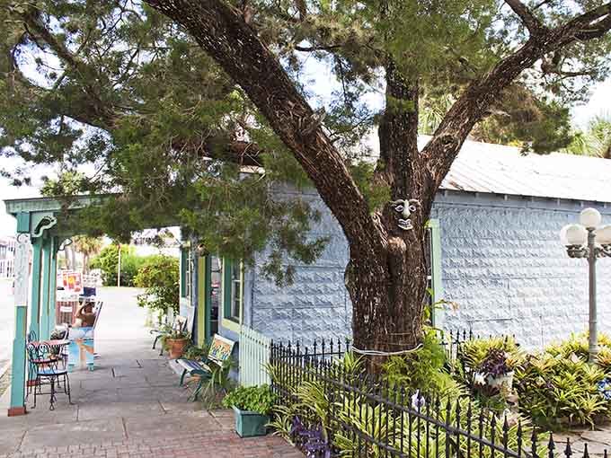 This little blue cottage in Cedar Key tells stories of island life with every weathered board and potted plant.