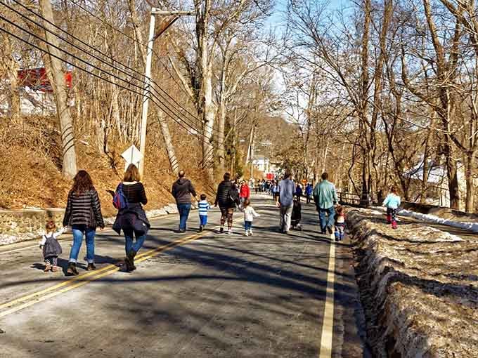 Families stroll together on roads where the journey matters more than the destination, and nobody's checking their watch.